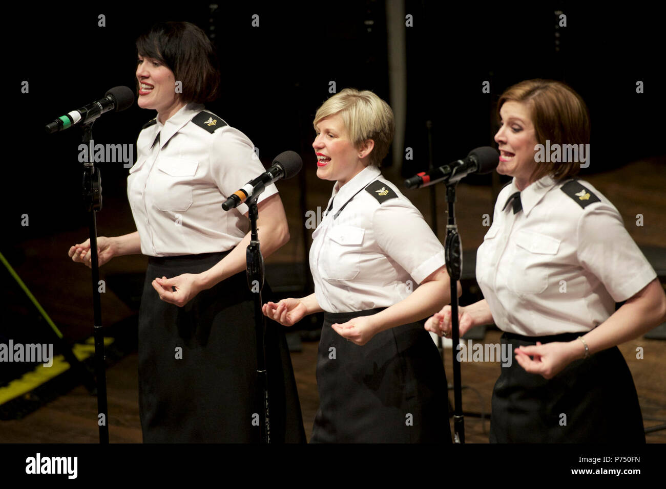 MACON, Ga. (Feb. 22, 2015) Members of the Navy Band Sea Chanters chorus ...