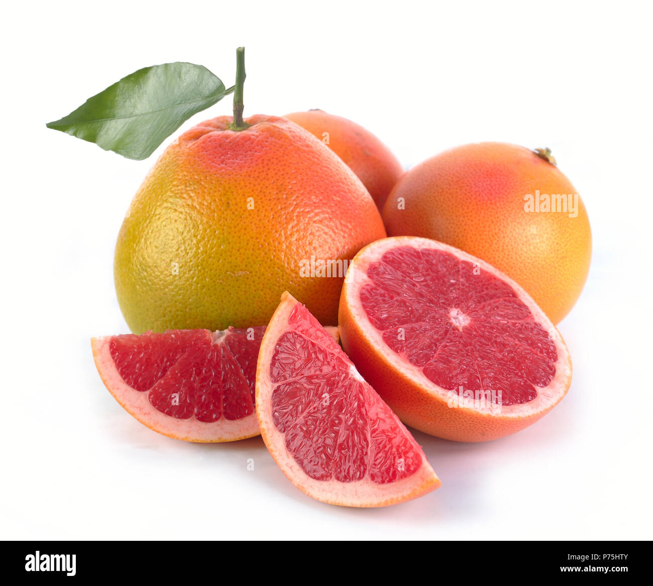 Grapefruit with segments on a white background Stock Photo - Alamy