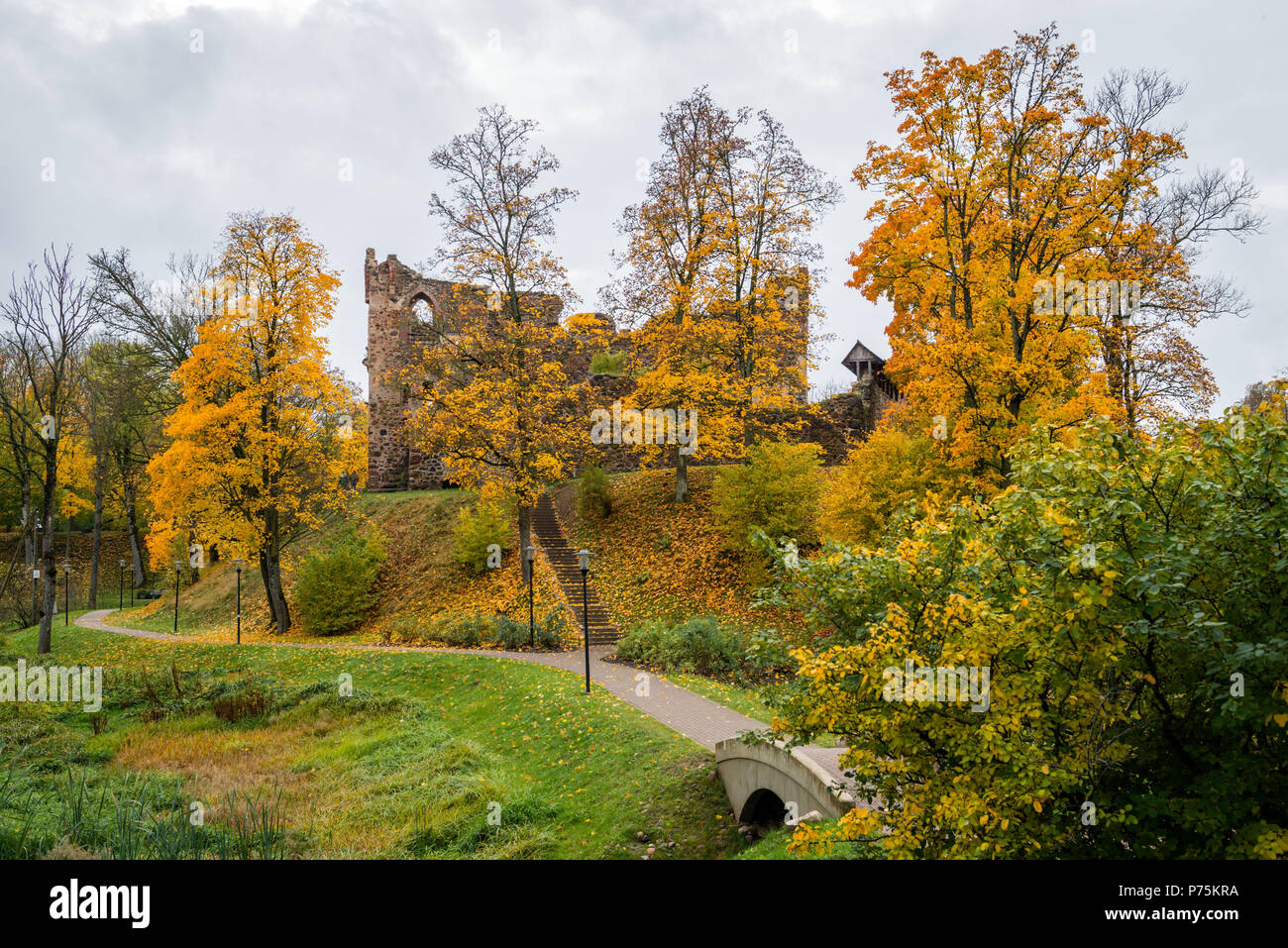 Dobele. Latvia. Autumn landscape with medieval castle ruins and river ...
