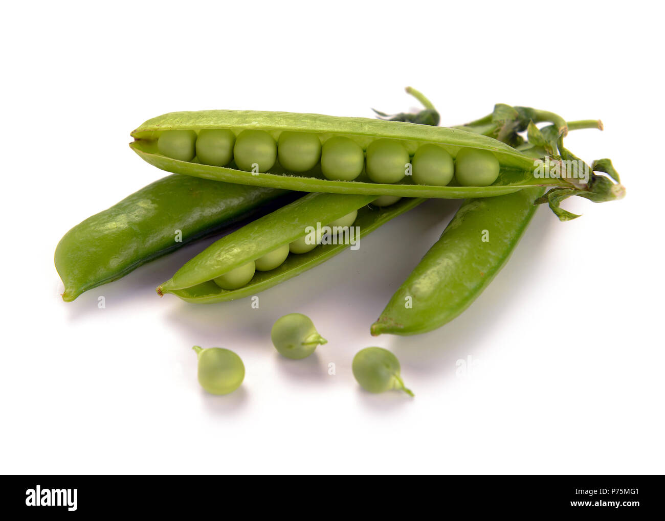 Ripe pea vegetable on white background Stock Photo - Alamy