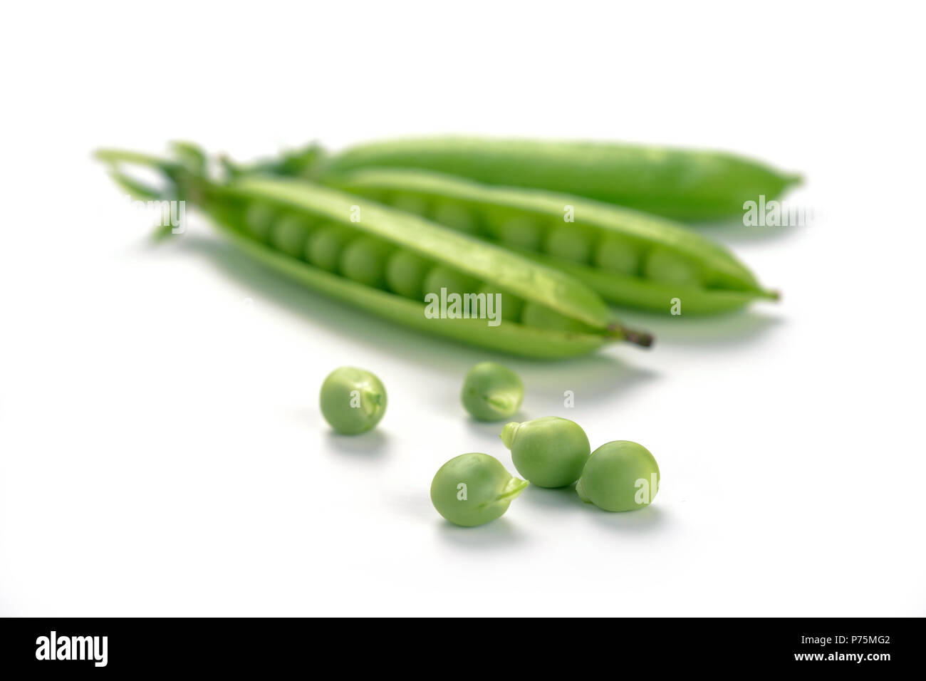 Ripe pea vegetable on white background Stock Photo - Alamy