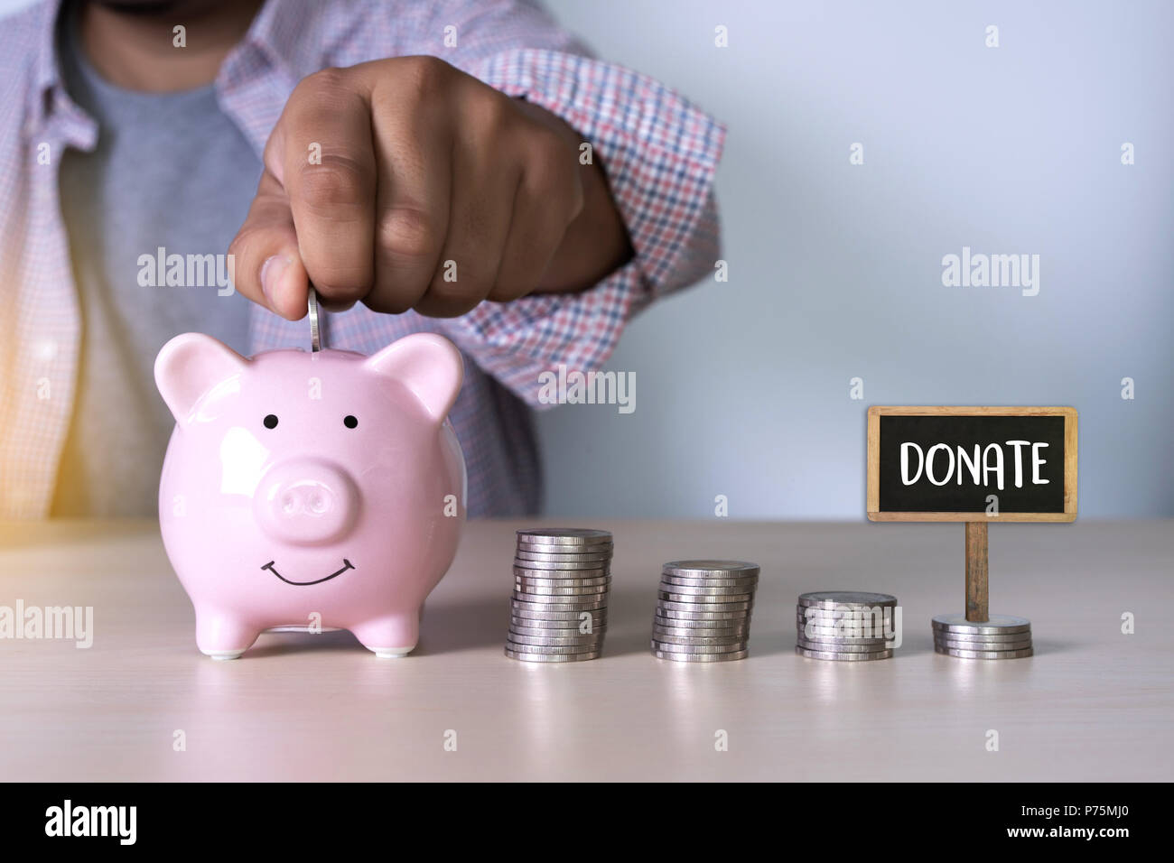 DONATE concept giving and donation Charity Give Help Stock Photo - Alamy