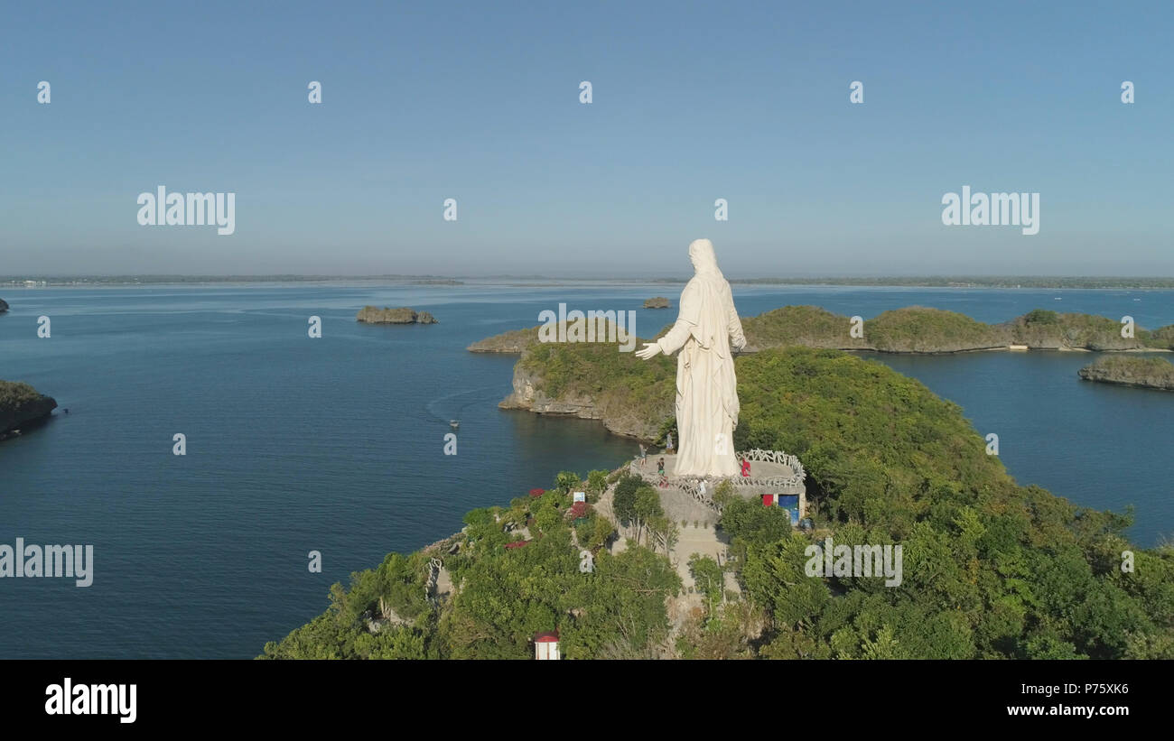 Statue of Jesus Christ on Pilgrimage island in Hundred Islands National ...
