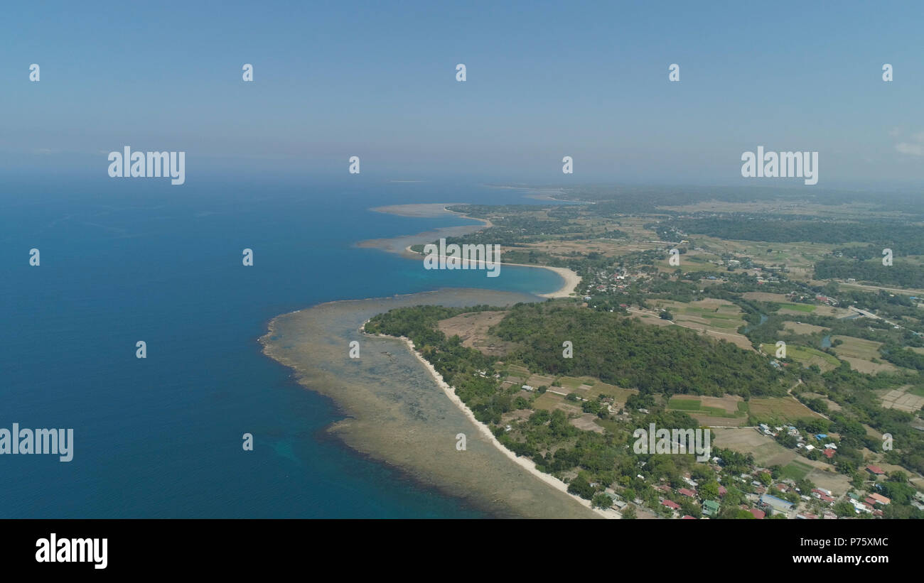Aerial view of seashore with beaches, lagoons and coral reefs ...