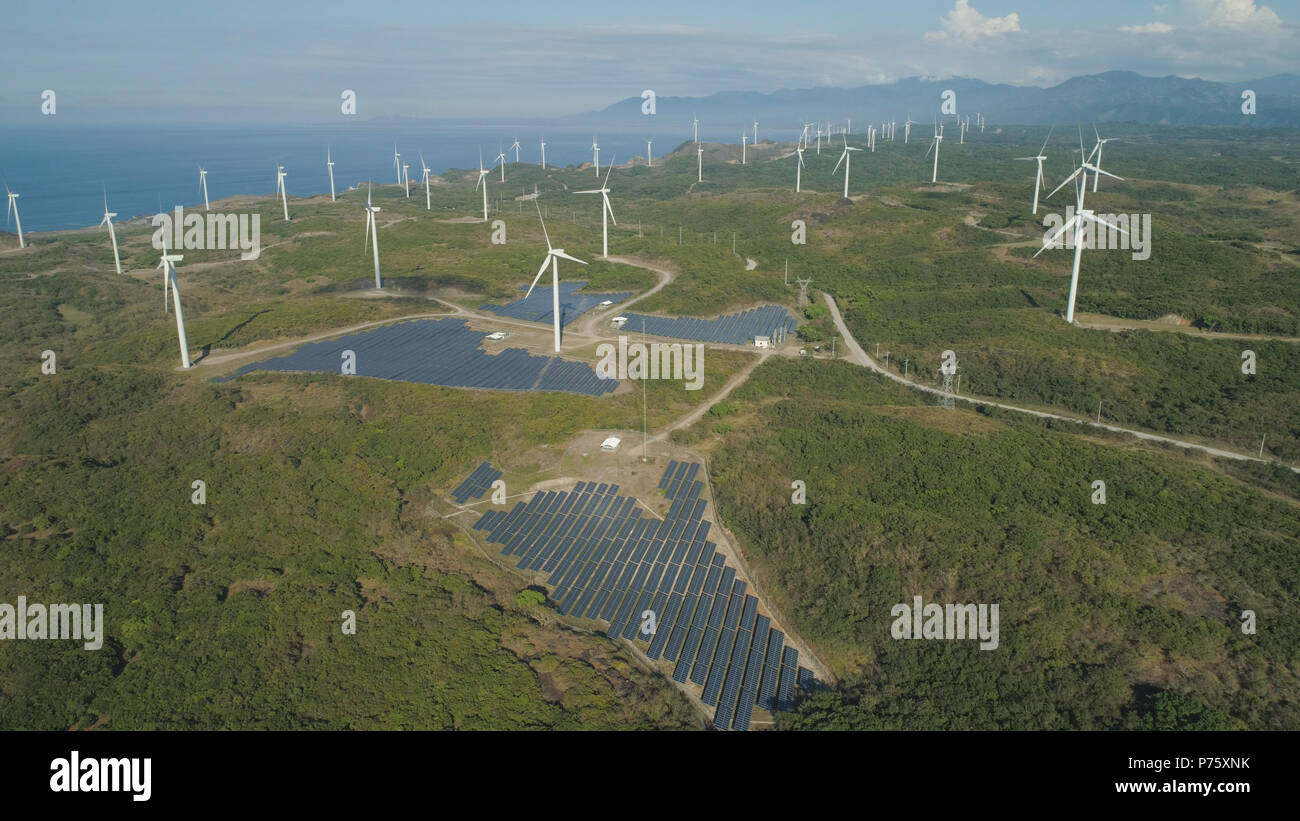 Aerial view of Windmills for electric power production on the seashore ...