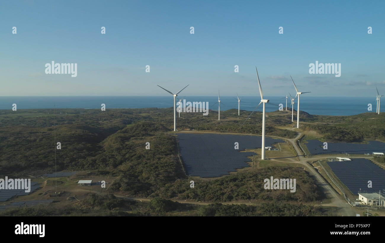 Aerial view of Windmills for electric power production on the seashore ...