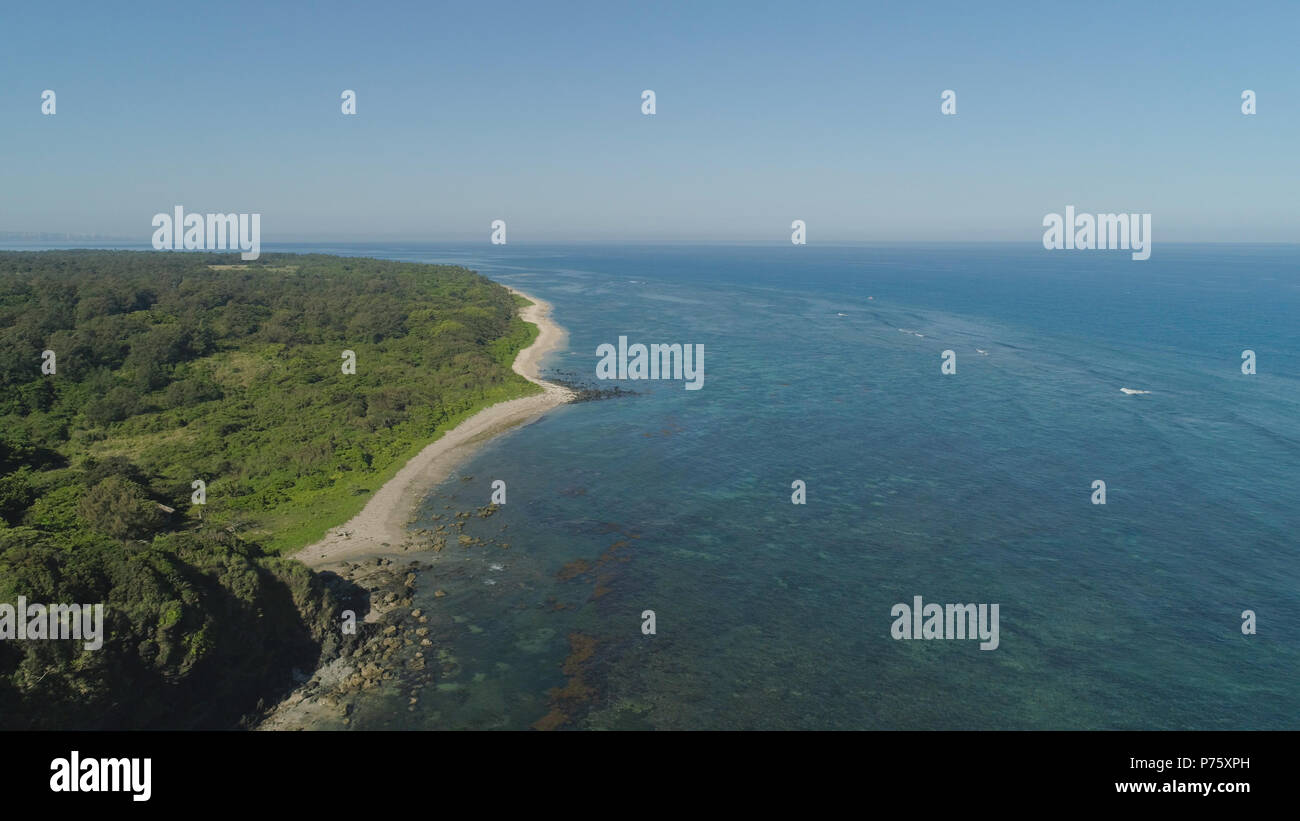 Aerial view of seashore with beach, lagoons and coral reefs ...