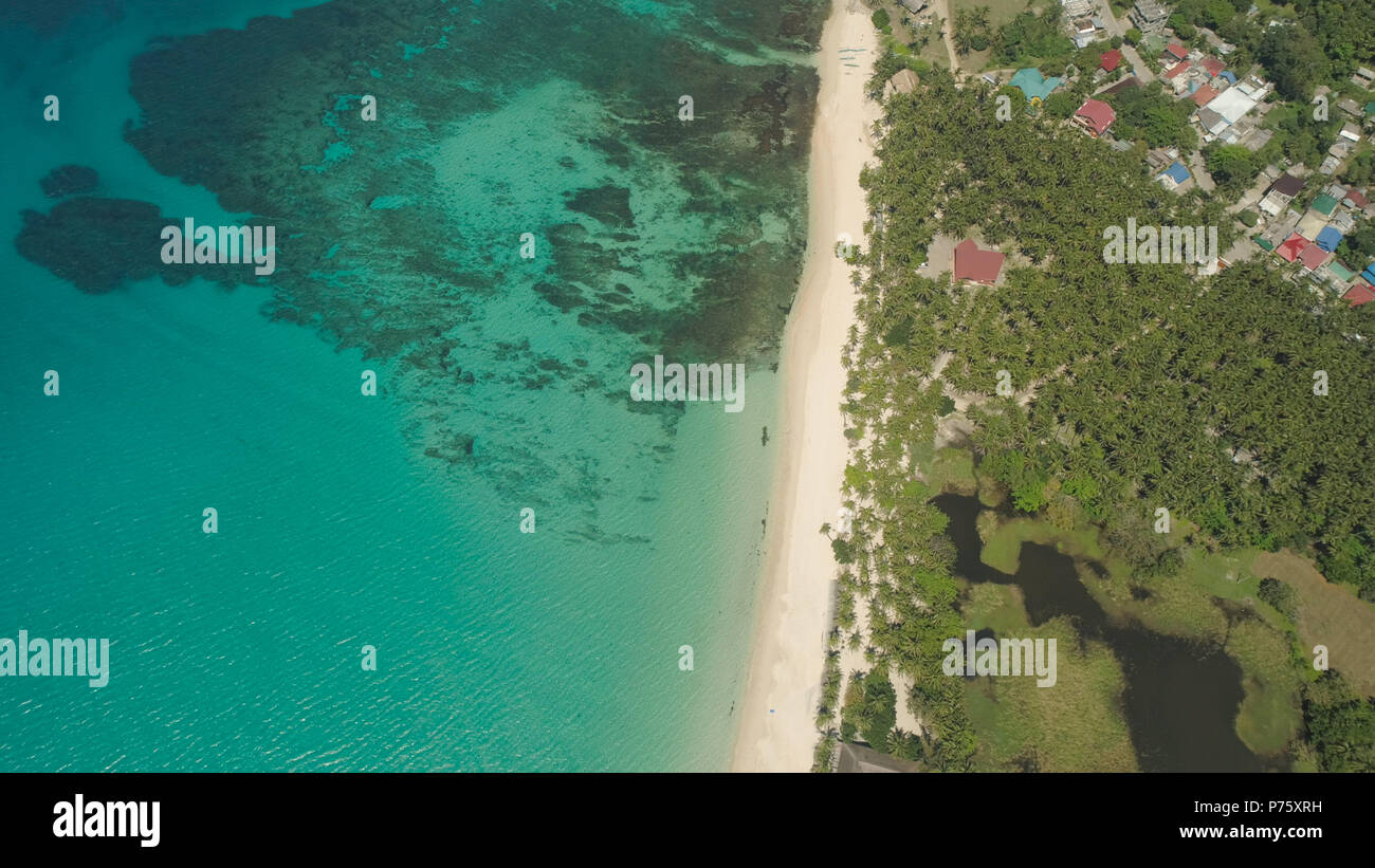 Aerial view of beautiful tropical beach Saud with turquoise water in ...