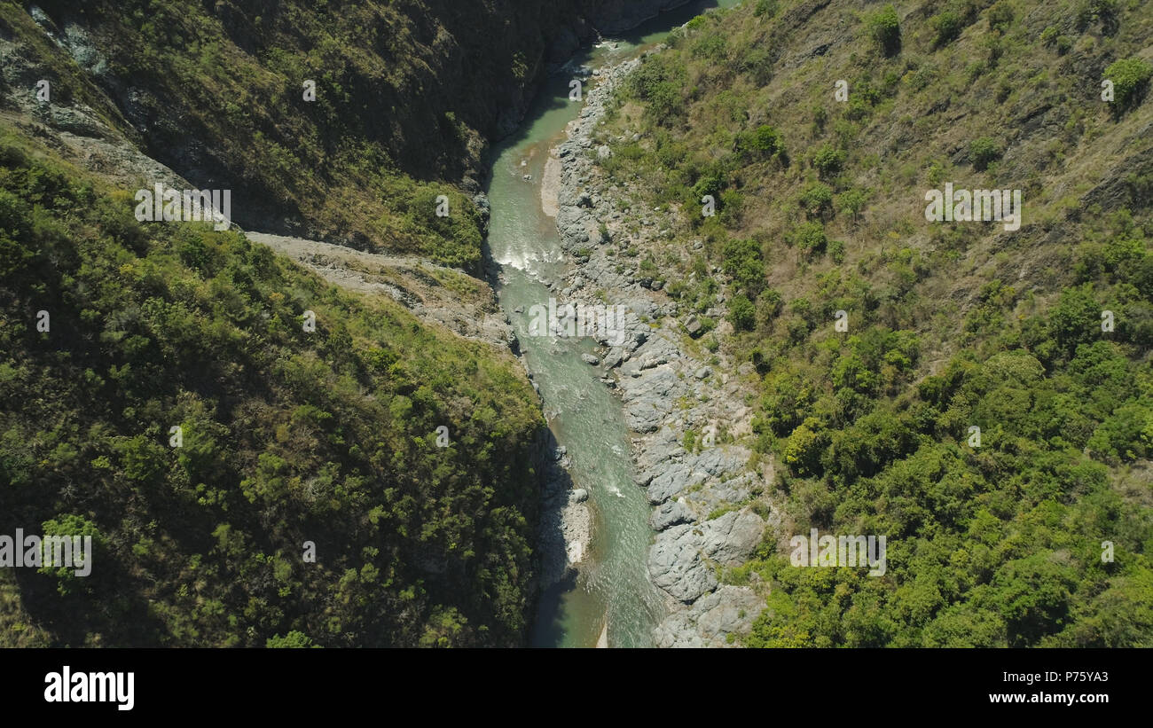 Aerial view of mountain river in the cordillera gorge, mountains ...