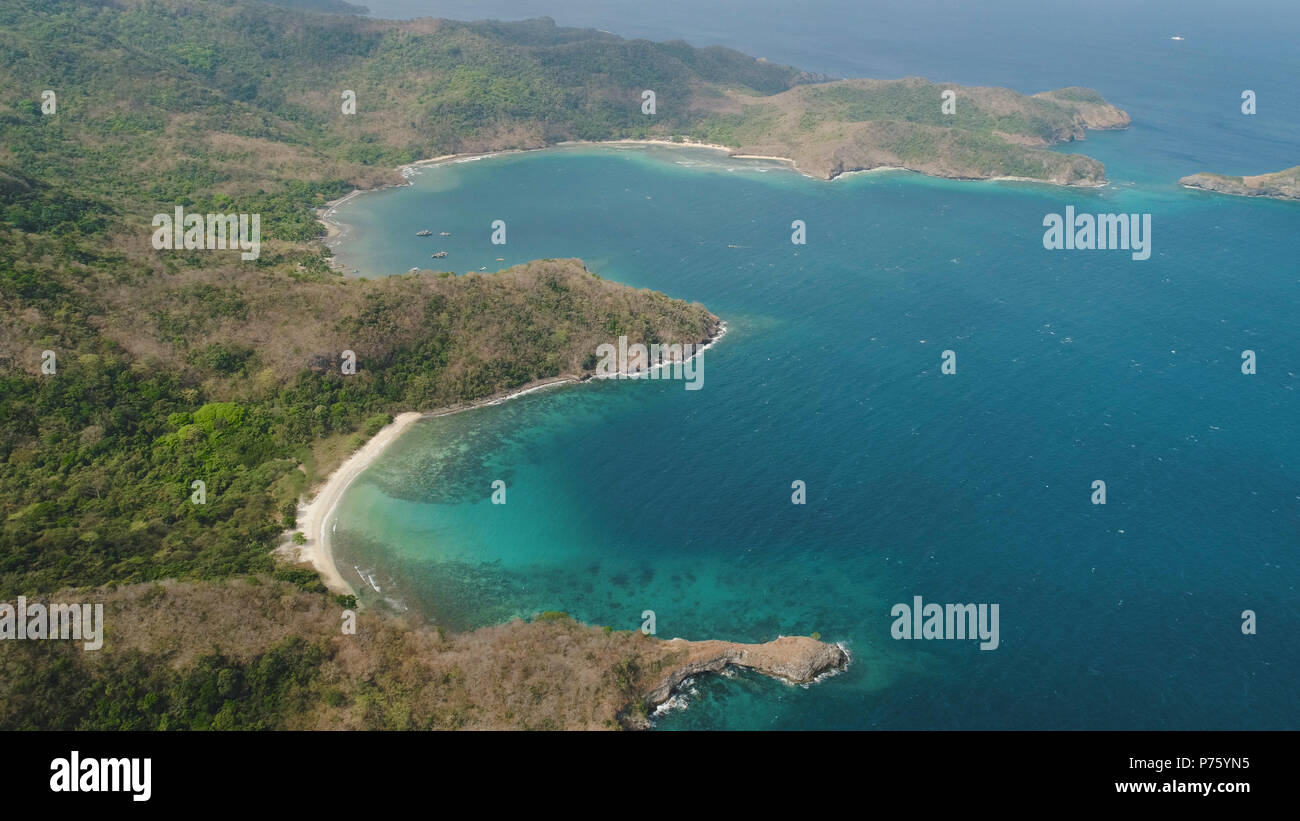 Aerial view of seashore with beach, lagoons and coral reefs ...