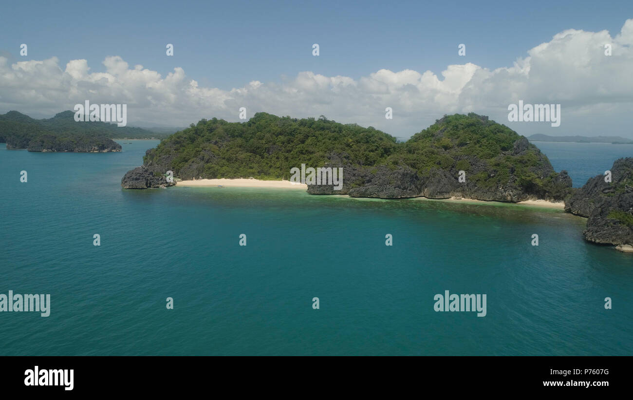 Aerial view Matukad island with sand beach and turquoise water in blue ...