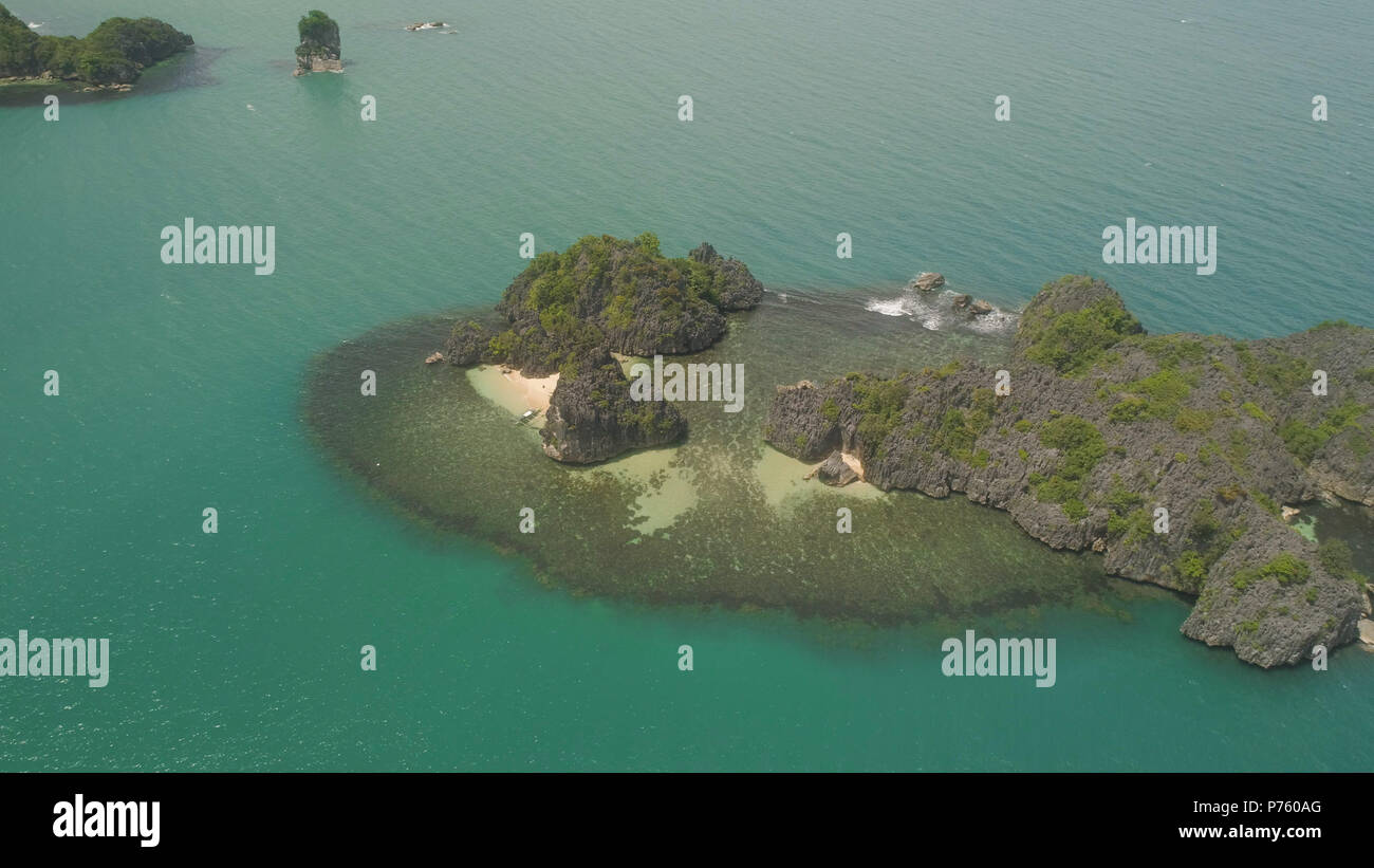 Aerial view of island Kagbalinad with sand beach and turquoise water in ...