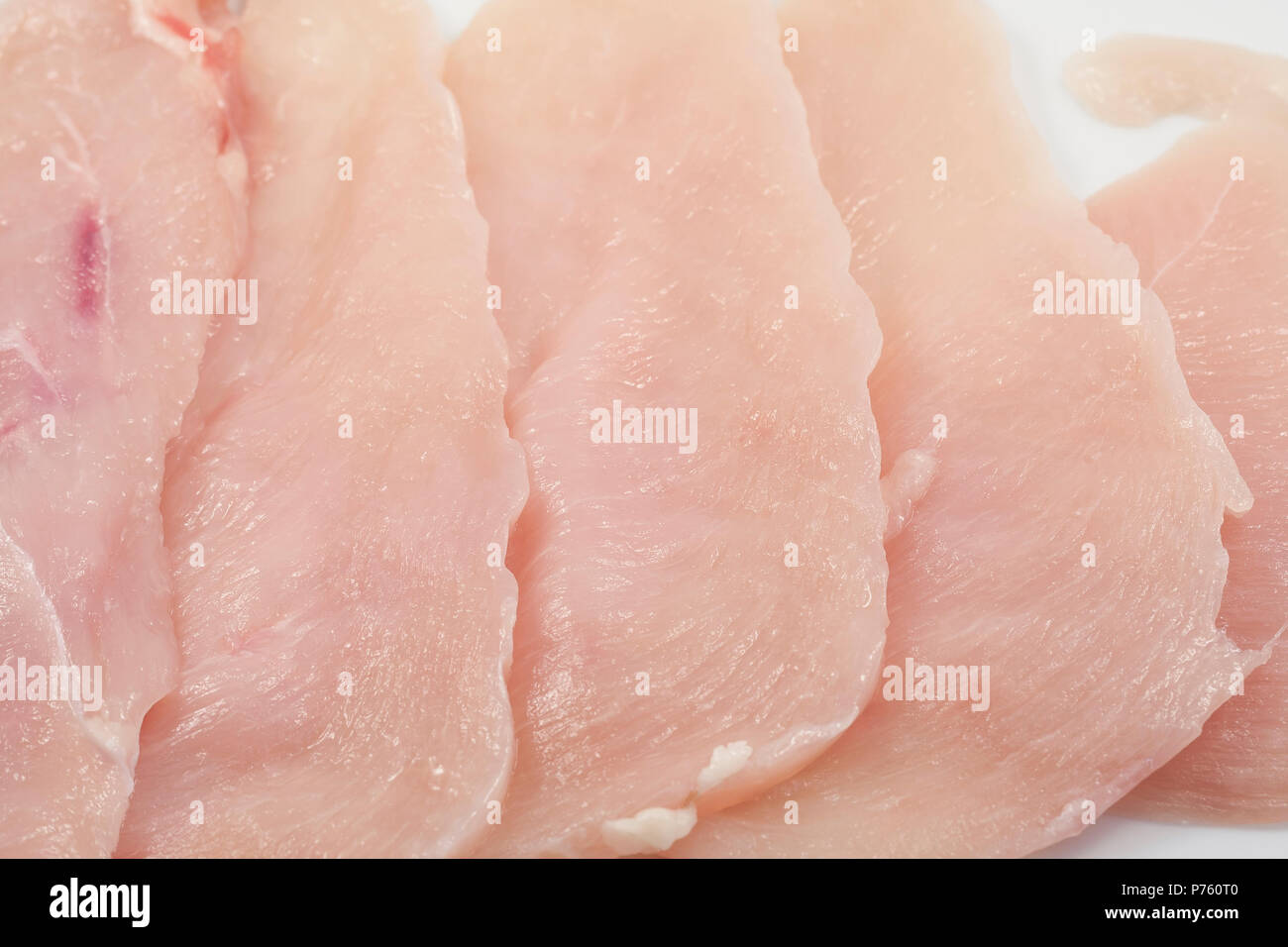 several breaded chicken isolated on white background Stock Photo - Alamy