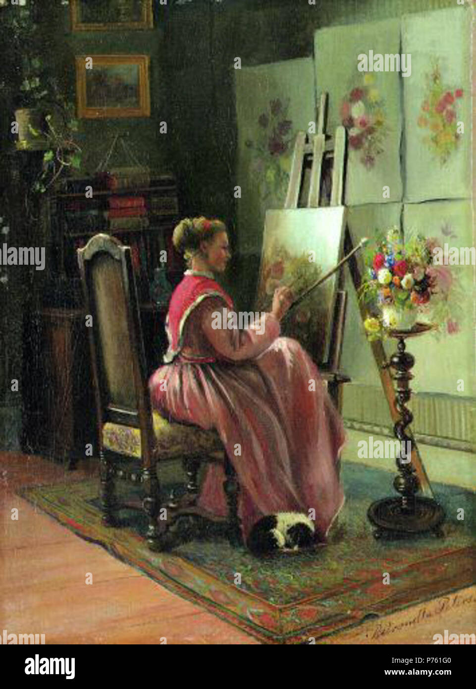 Die junge Künstlerin Anna Peters an der Staffelei in ihrem Atelier ...