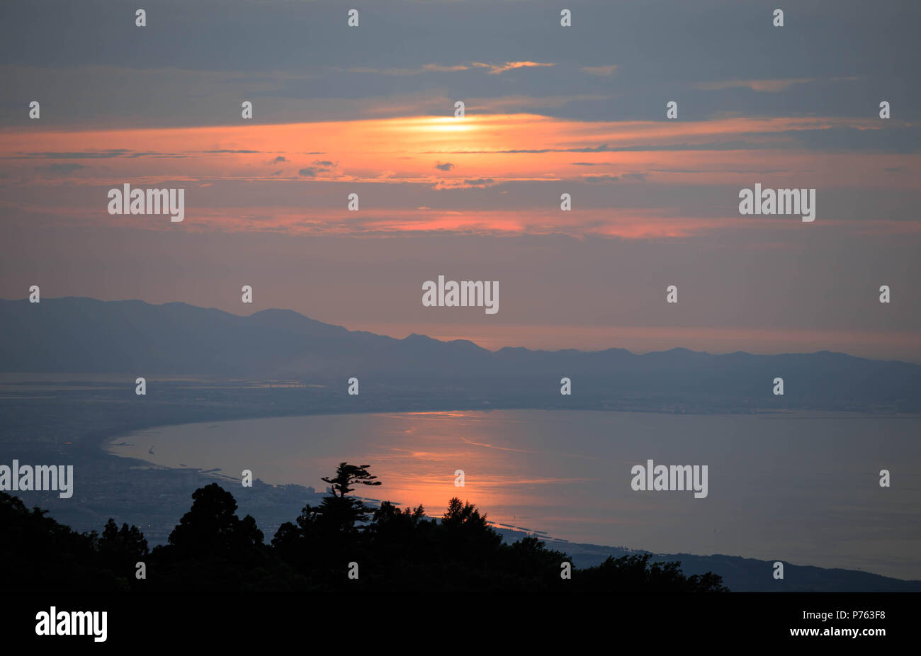 Brilliant orange sunset reflecting of Miho Bay on the Sea of Japan ...