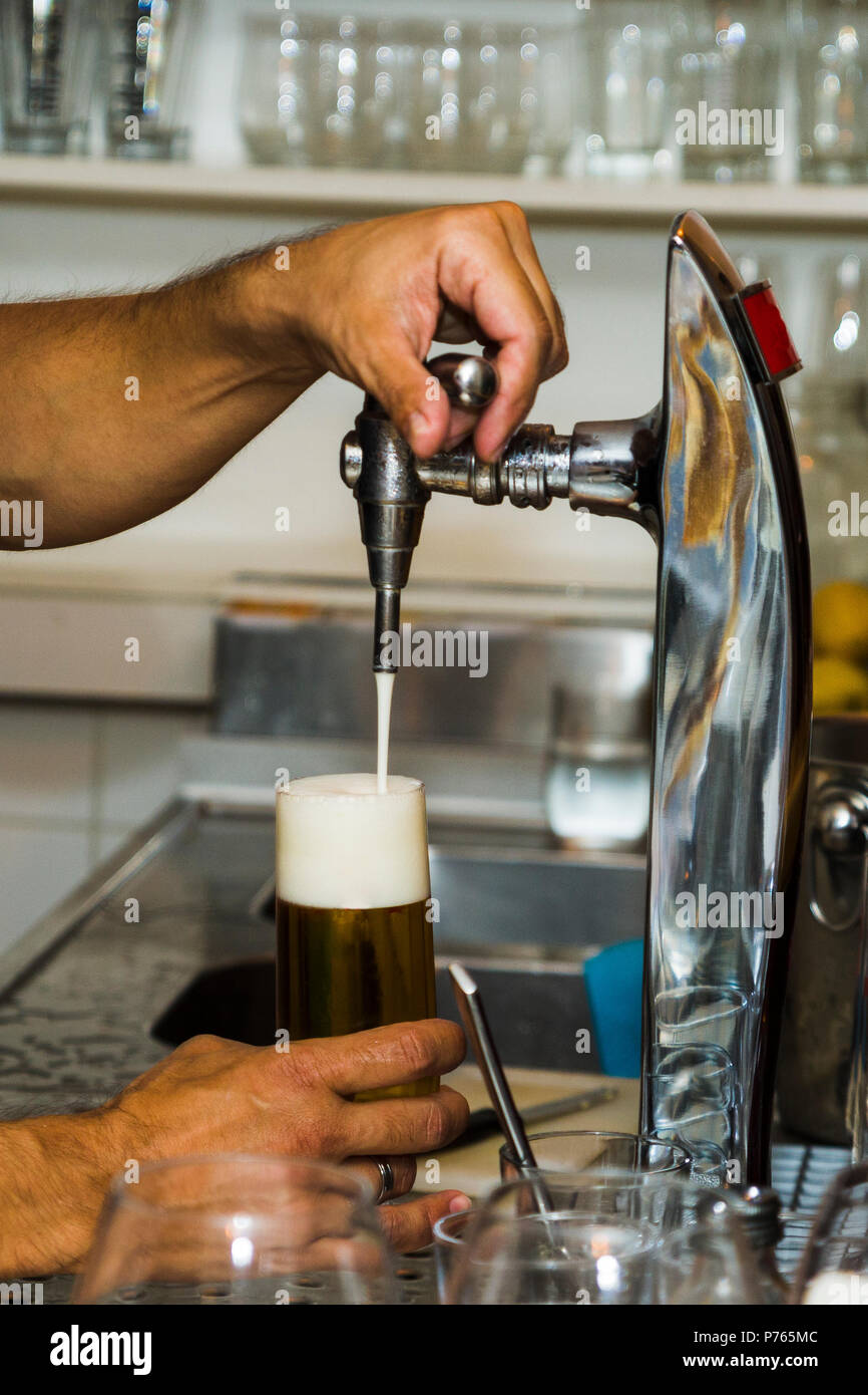 Pouring cold light beer from hi-res stock photography and images - Alamy