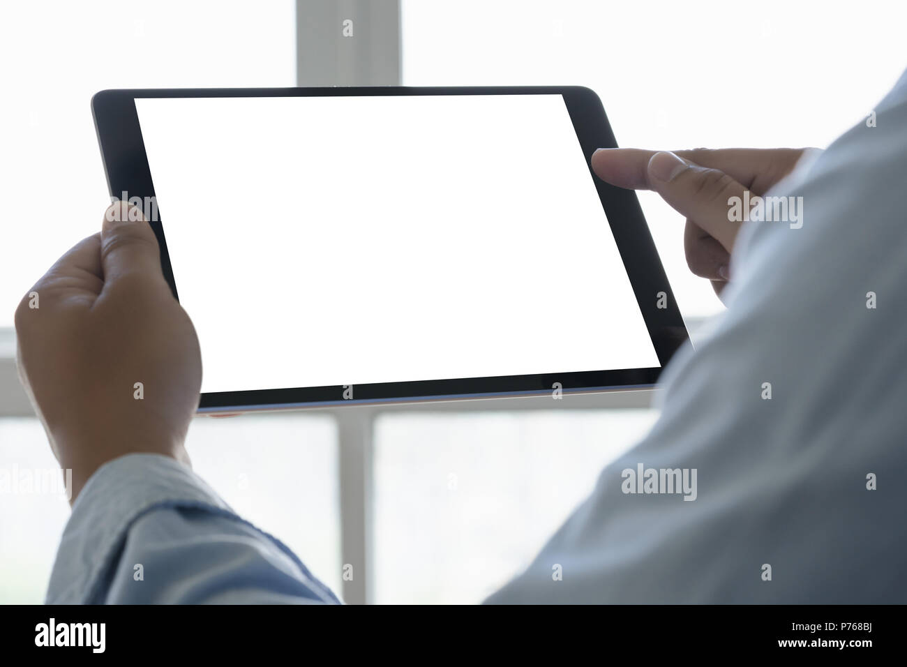 Digital tablet computer close up man using tablet hands man ...