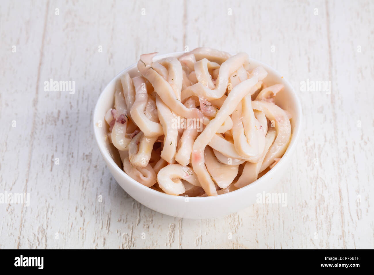 Delicious bowl of squid meat Stock Photo - Alamy