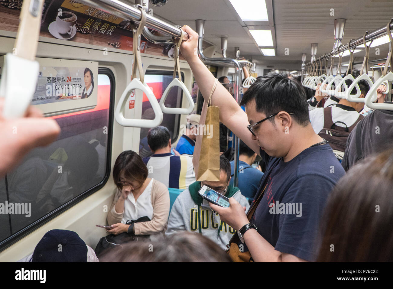 Mobile,phone,usage,interior,train,carriage,MRT,metro,rail,train ...