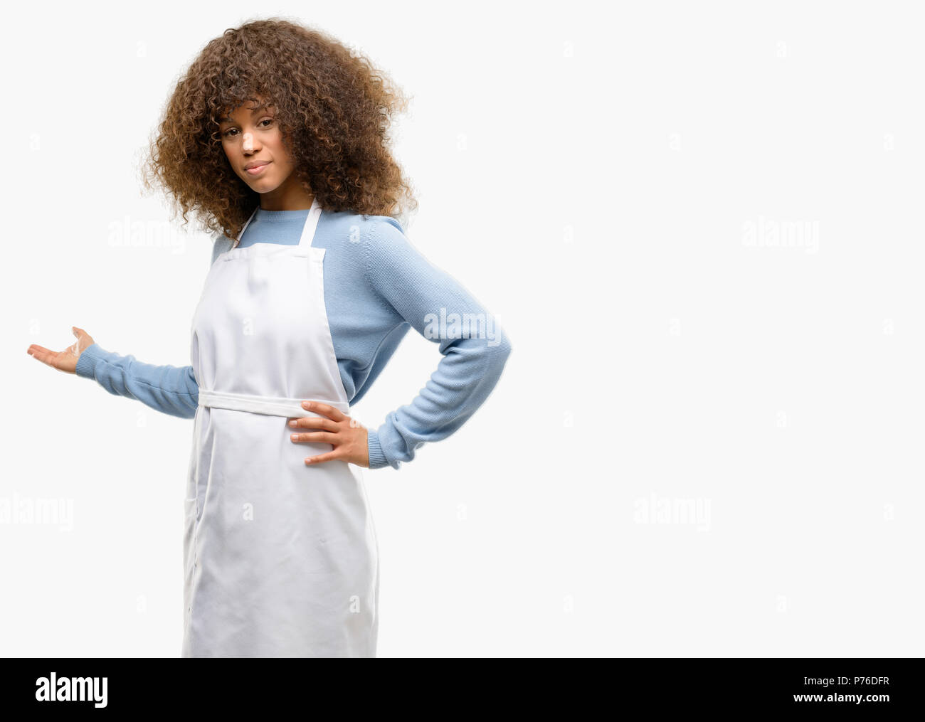 Smiling shopkeeper Cut Out Stock Images & Pictures - Alamy