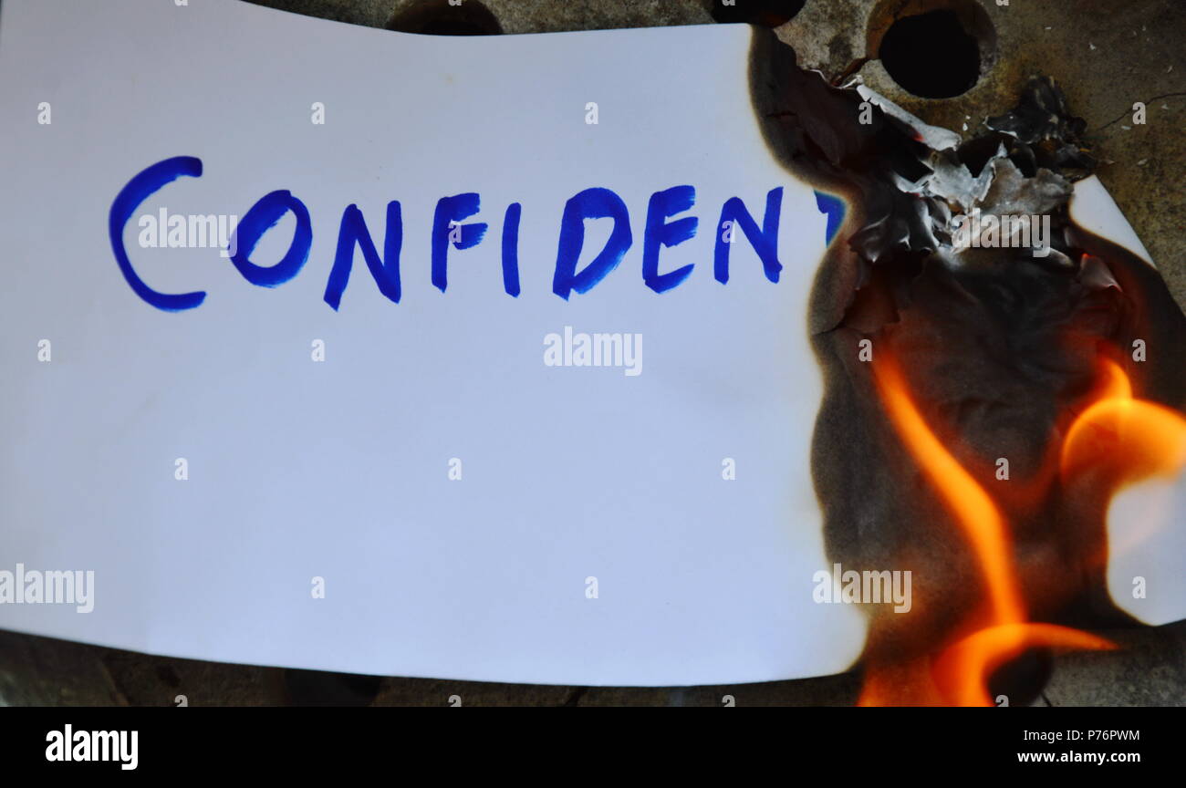 envelope burn on clay stove Stock Photo - Alamy