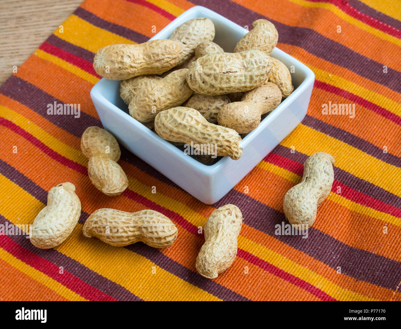 Unpeeled brown peanuts on hi-res stock photography and images - Alamy