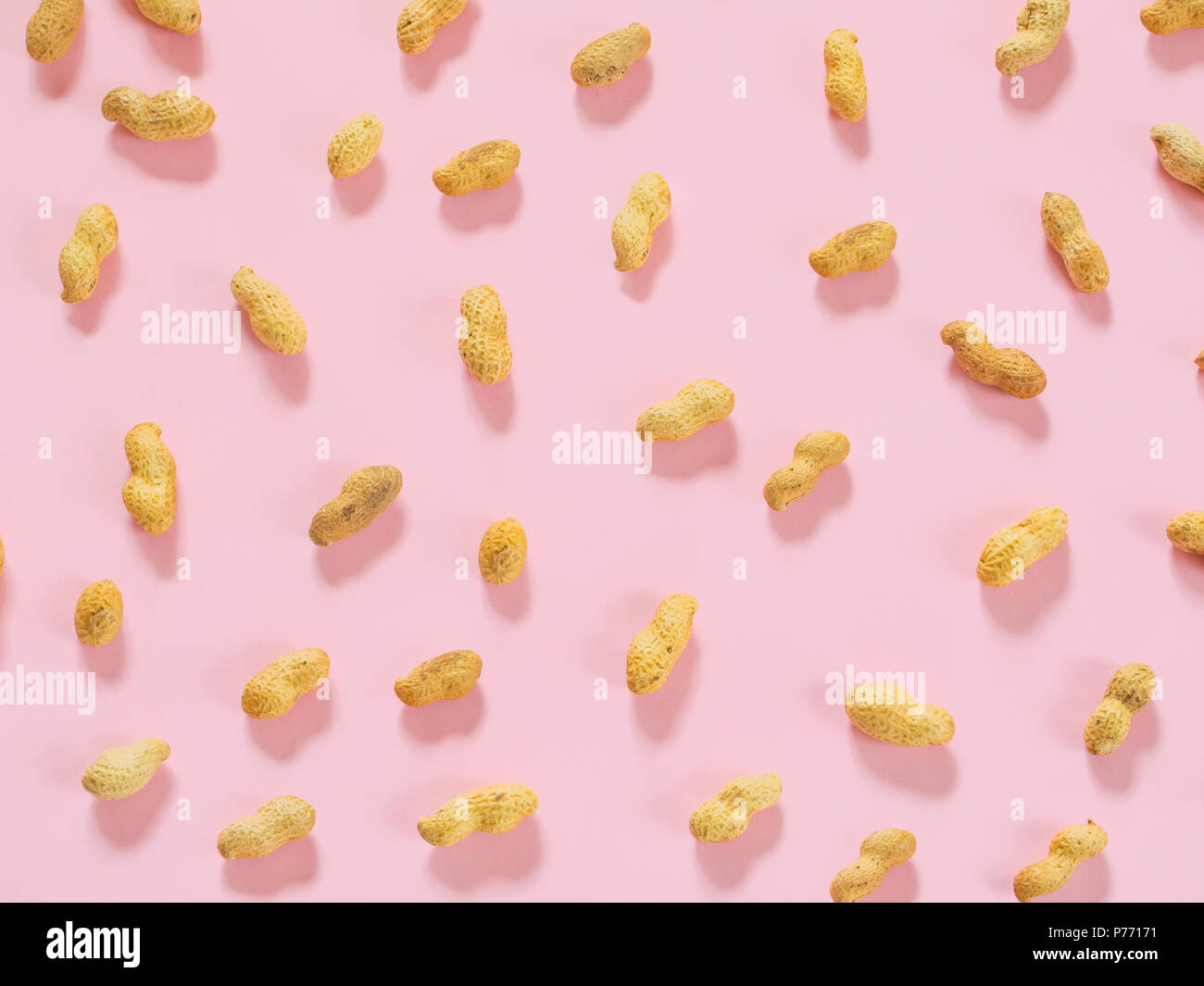 Peanuts pattern on pink background Stock Photo - Alamy
