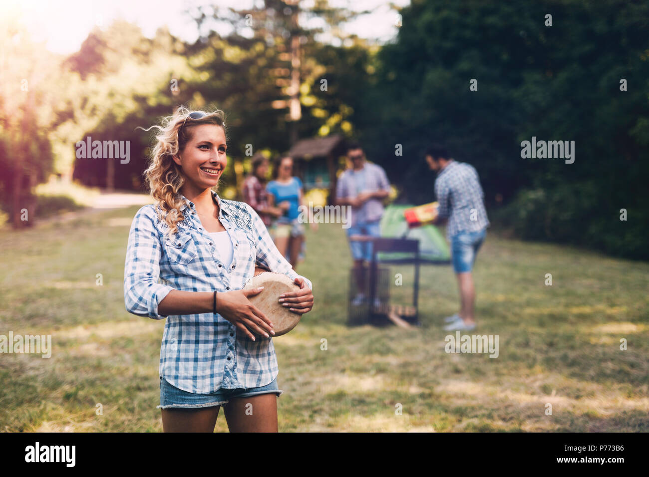 Woman playing drums having fun in nature Stock Photo - Alamy Woman playing drums having fun in nature Stock Photo - Alamy