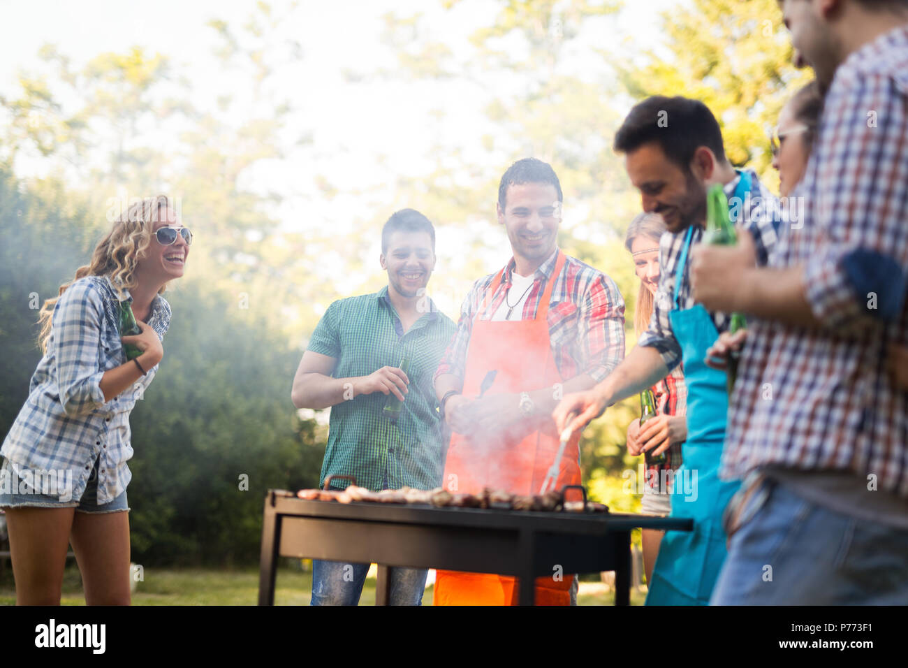 Young people in nature having fun Stock Photo - Alamy