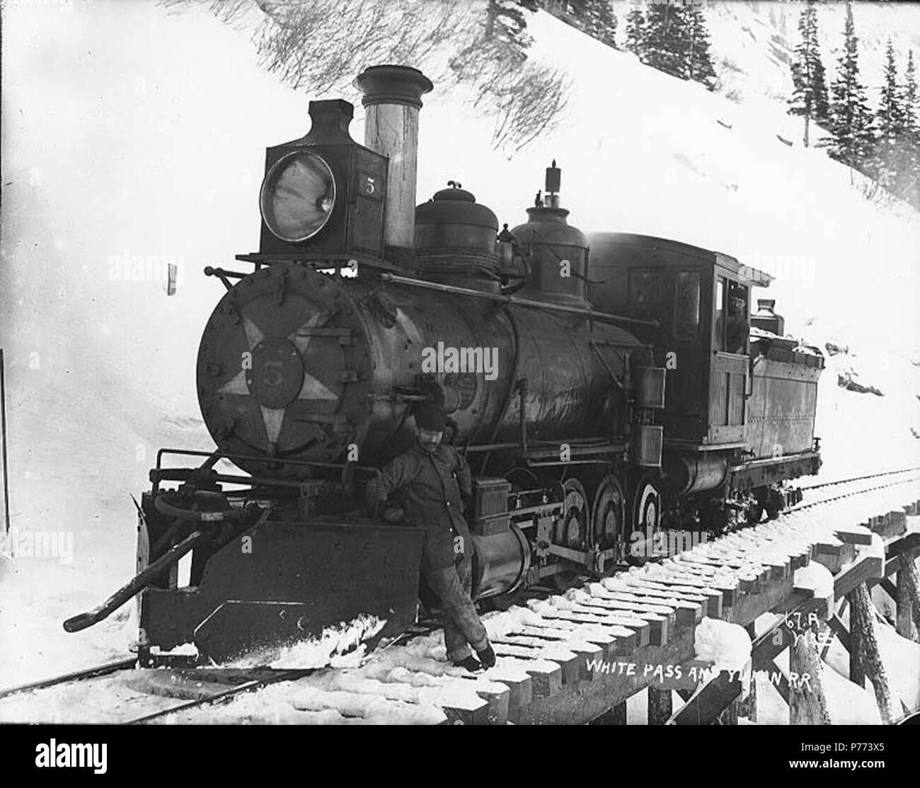 . English: Locomotive of the White Pass & Yukon Railroad on trestle ...