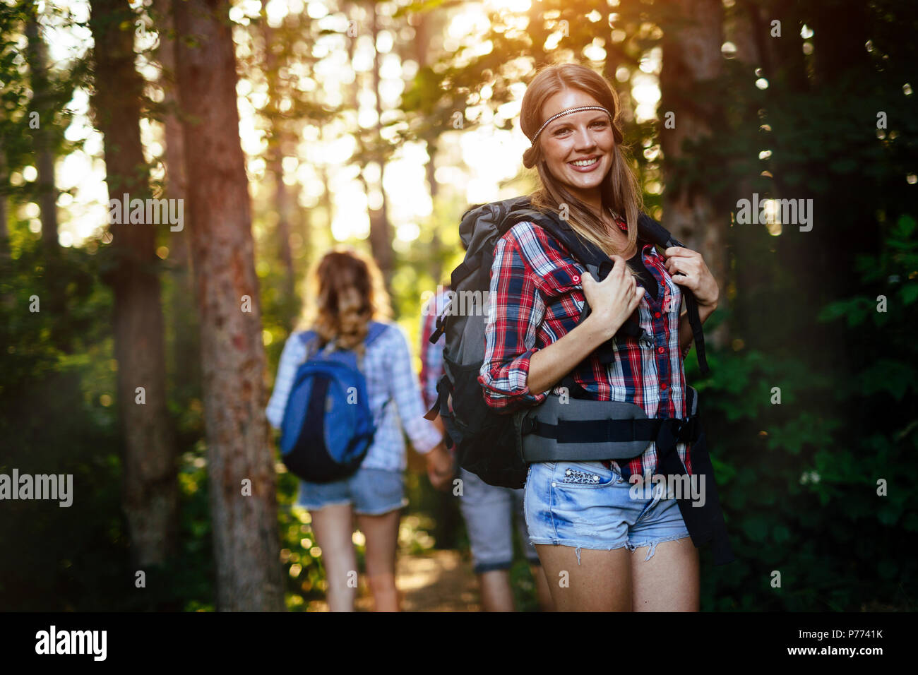 Friends tree trek forest hi-res stock photography and images - Alamy