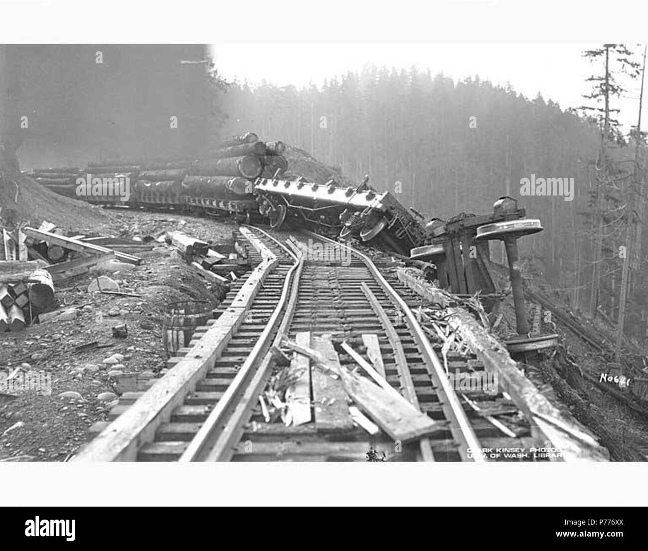 . English: Flatbed railroad logging cars which have derailed, St. Paul ...