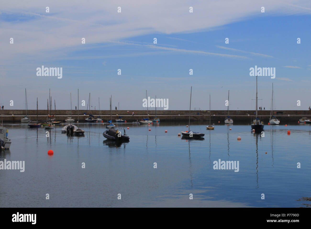 Small sea going vessels anchored in Howth Harbour, Dublin, Ireland ...