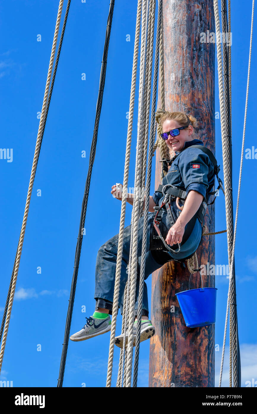 PORTSOY FESTIVAL ABERDEENSHIRE SCOTLAND BOAT RACES GIRL AND ROPES ...