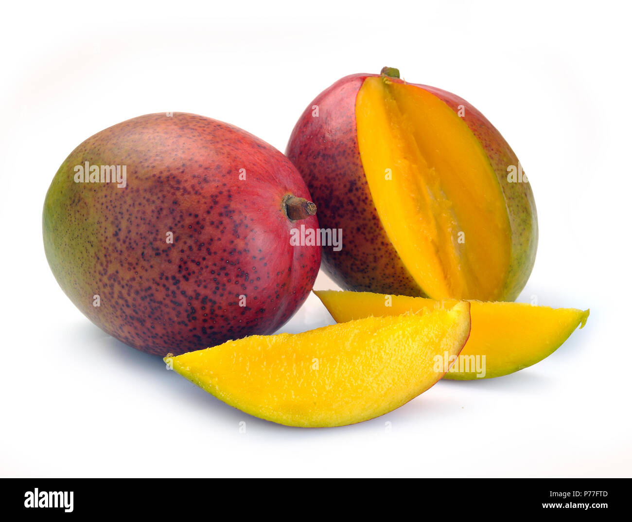 Mango with section on a white background Stock Photo - Alamy