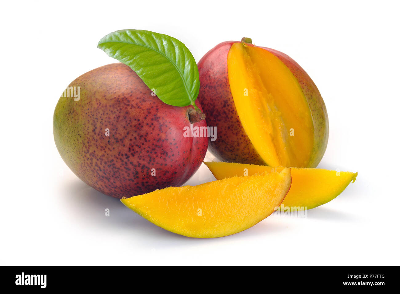 Mango with section on a white background Stock Photo - Alamy
