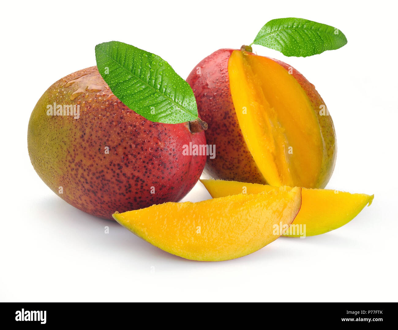 Mango with section on a white background Stock Photo - Alamy