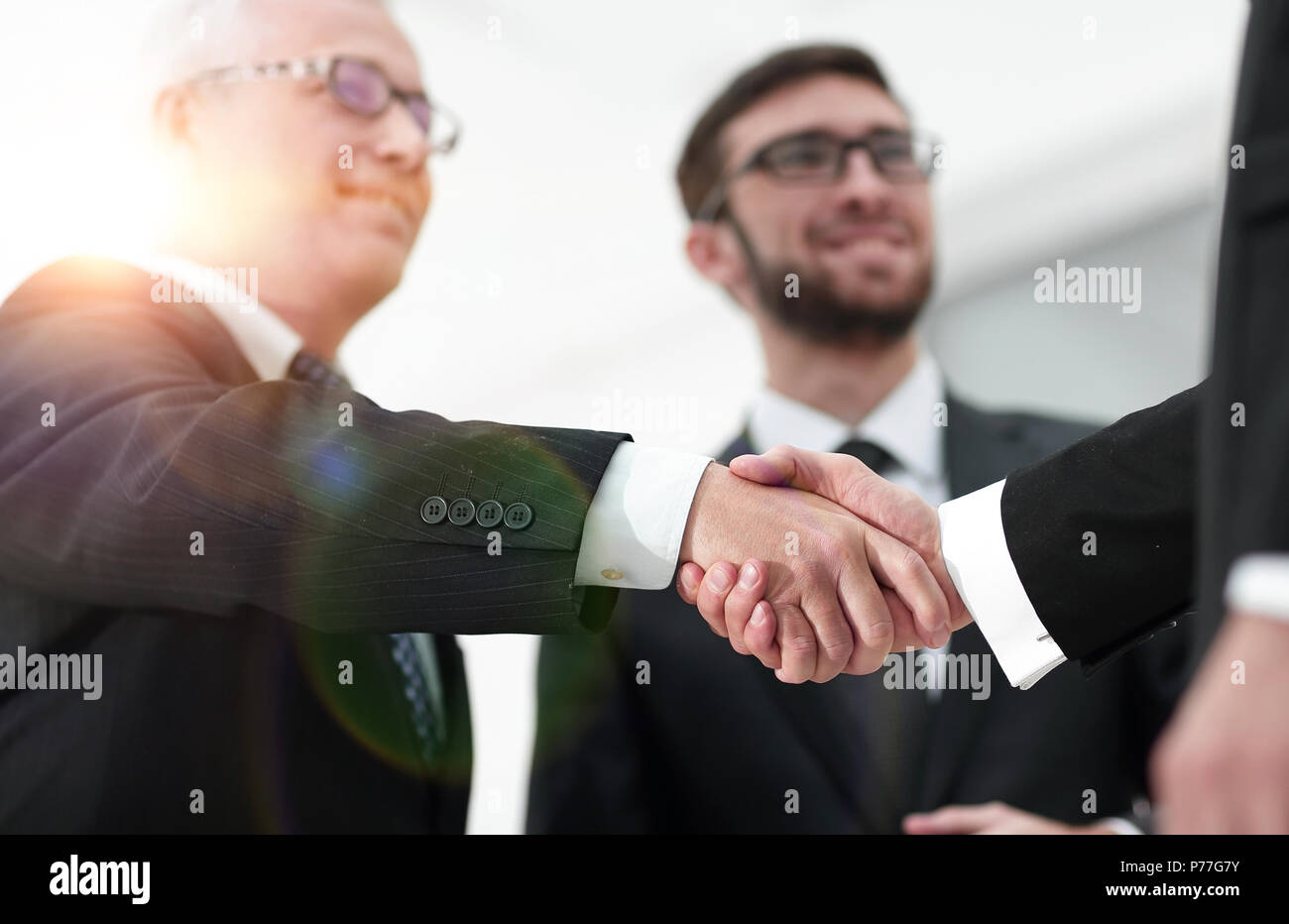 closeup handshake proven business partners Stock Photo - Alamy