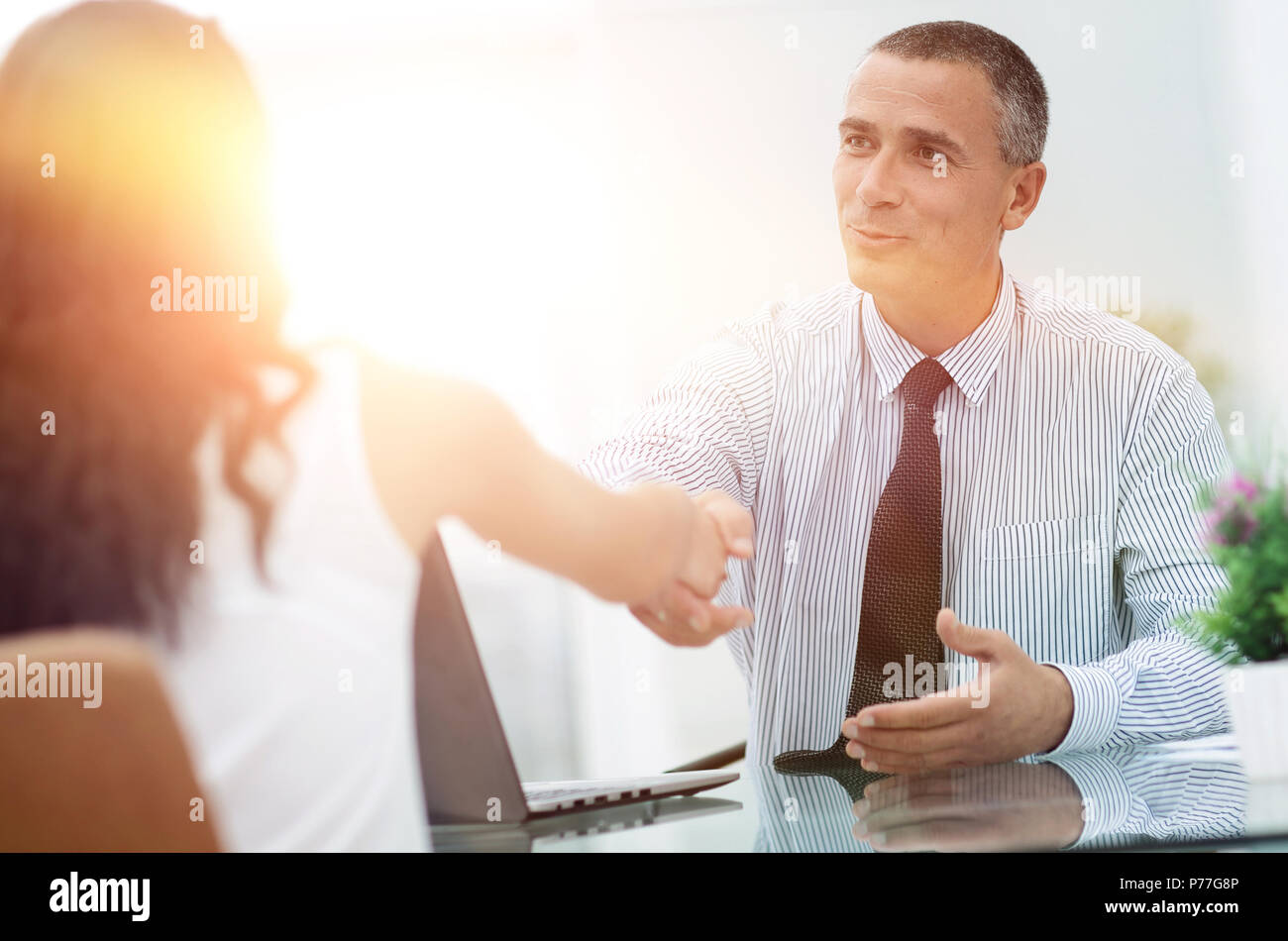 closeup.handshake Manager and client Stock Photo - Alamy