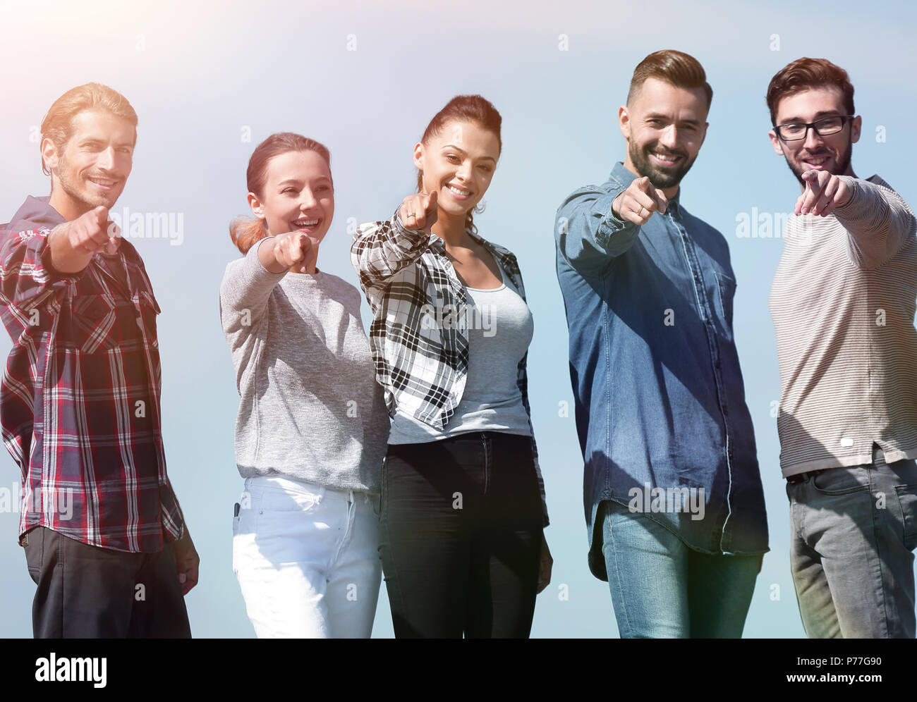confident young people showing hands forward Stock Photo - Alamy