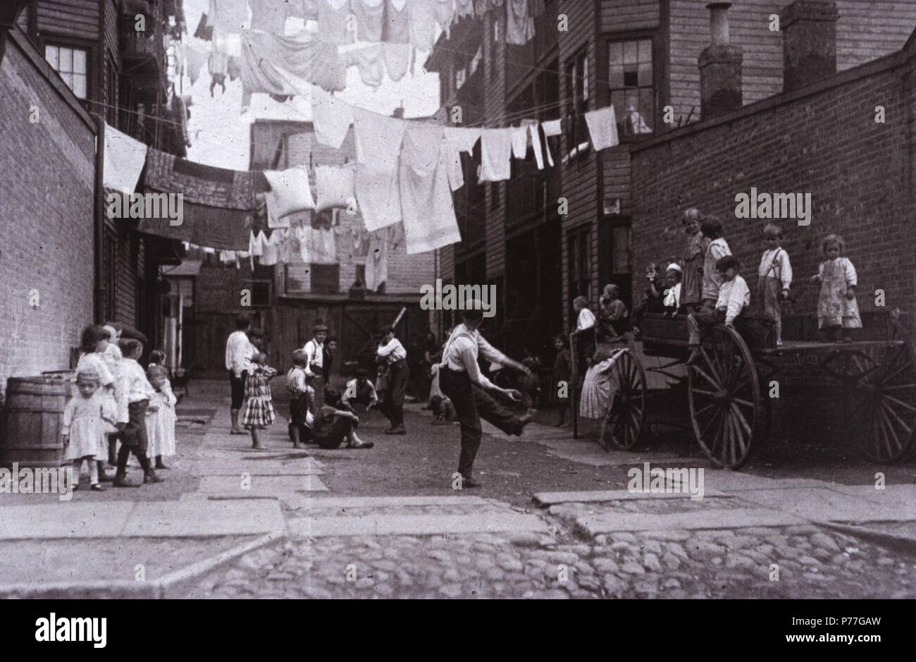 English: 'Playground in Tenement Alley,' Boston, MA, 1909. Lewis Hine ...