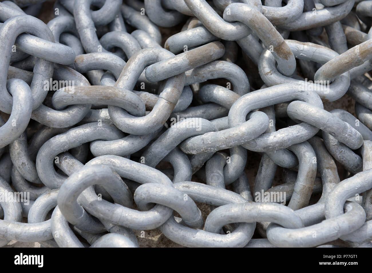 Abstract of thick rusty chain Stock Photo - Alamy