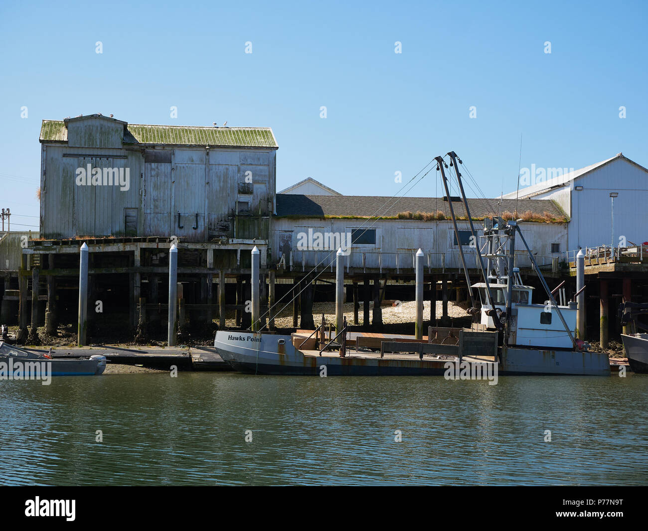 An oyster dredge is moored to a cannery dock in Nahcotta, on Willapa ...