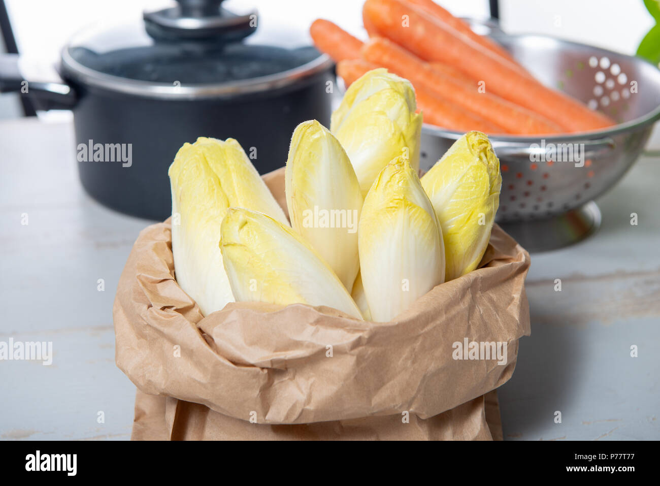 raw organic belgian or french yellow endives Stock Photo - Alamy