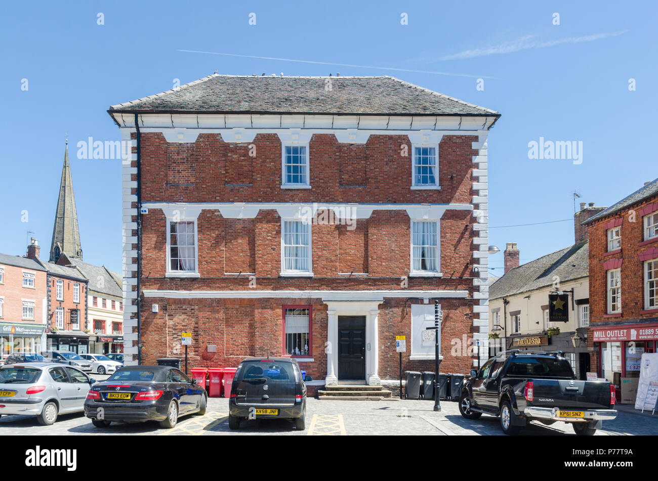 Shops and offices in Market Place in the Staffordshire market town of ...