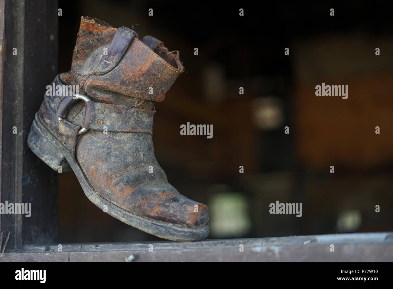 Old dusty vintage boot at abandoned building Stock Photo - Alamy
