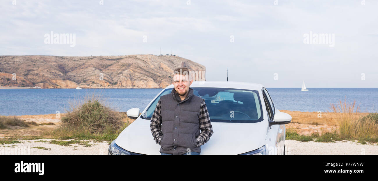 Young guy standing in front of car hi-res stock photography and images ...