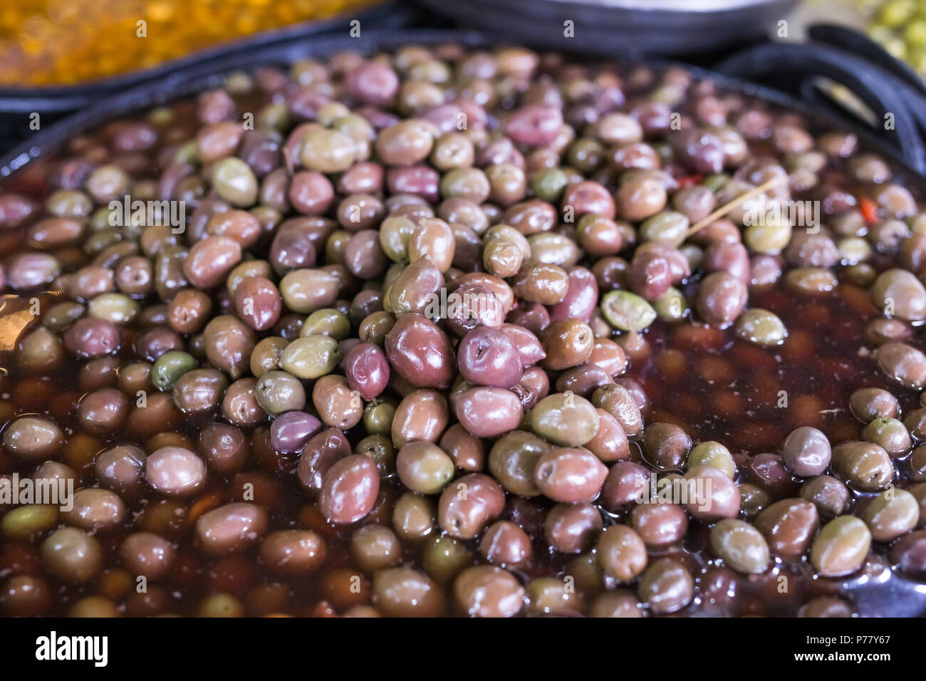 Olives come in different varieties now represented by red Stock Photo ...