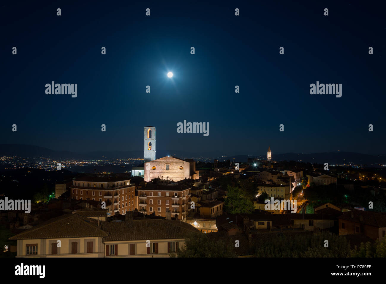 night view of old town of Perugia with moon on top, Umbria, Italy Stock ...