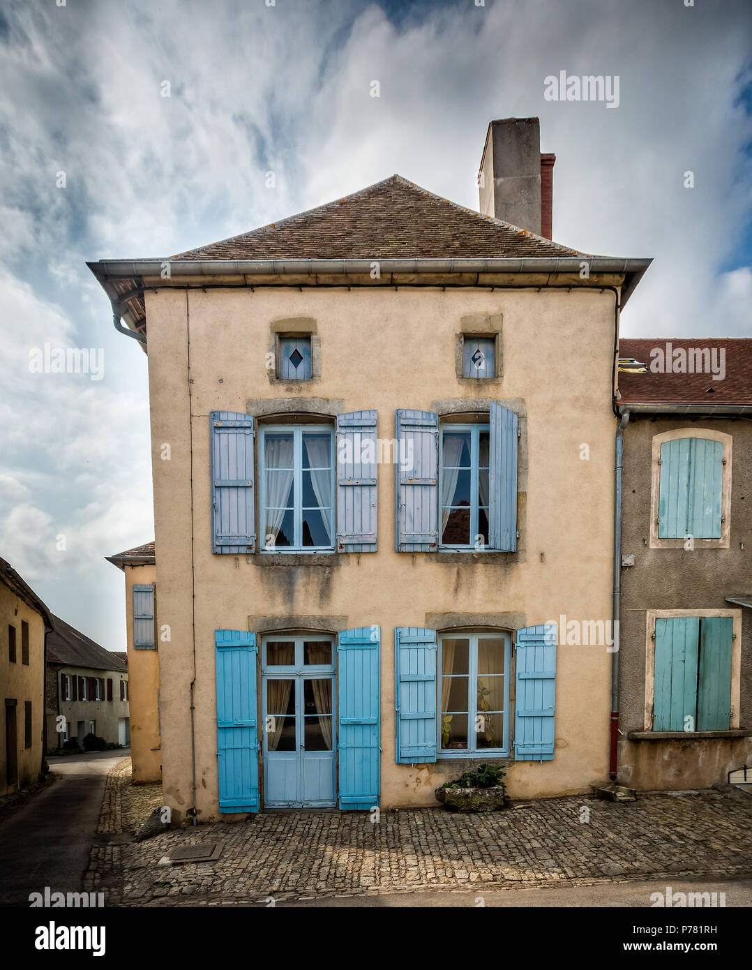 French house with blue shutters taken in Mont St Vincent, Burgundy ...